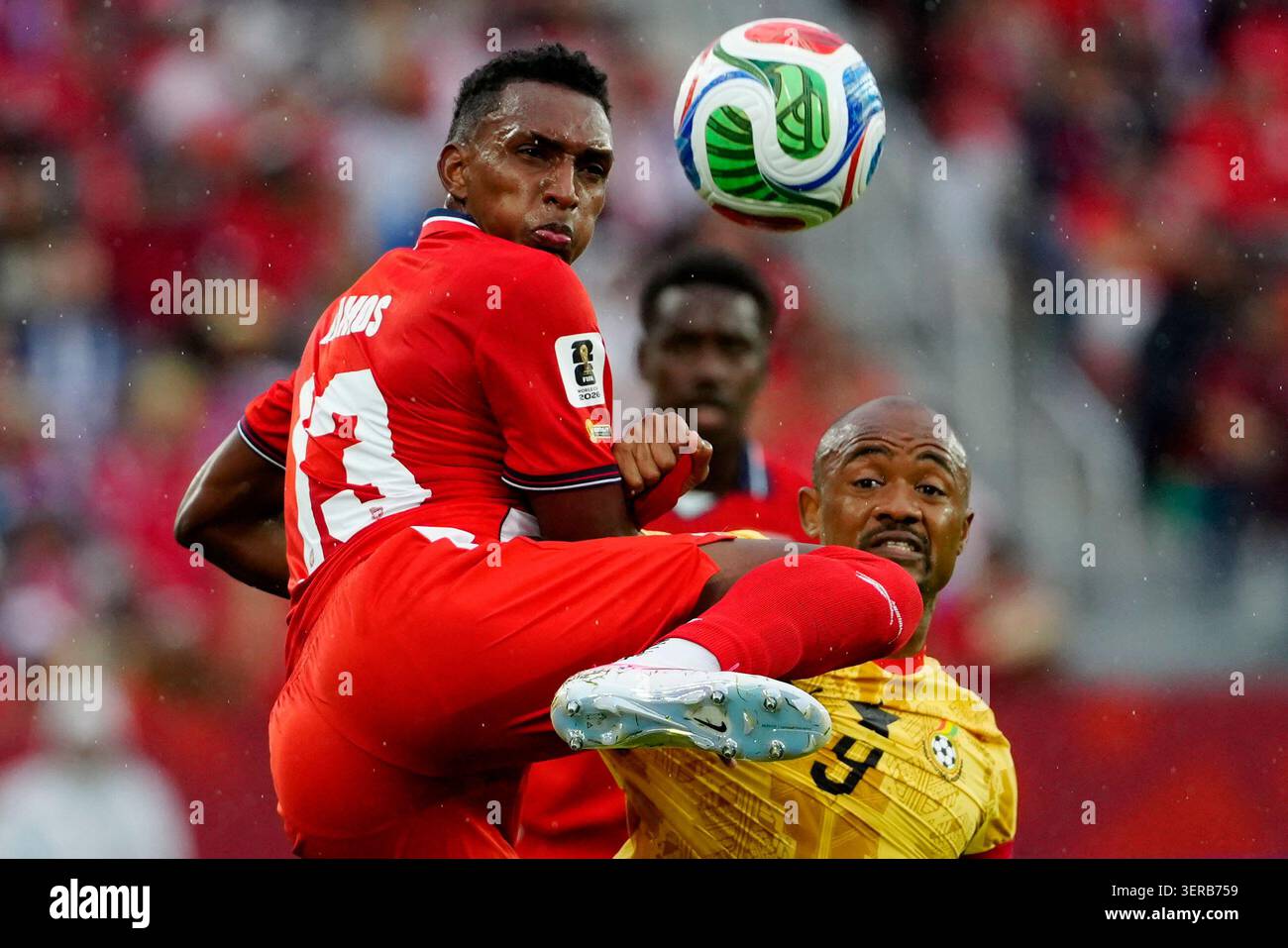 Panama's Jiovany Ramos (13) and Ghana's Jordan Ayew (9) vie for control ...