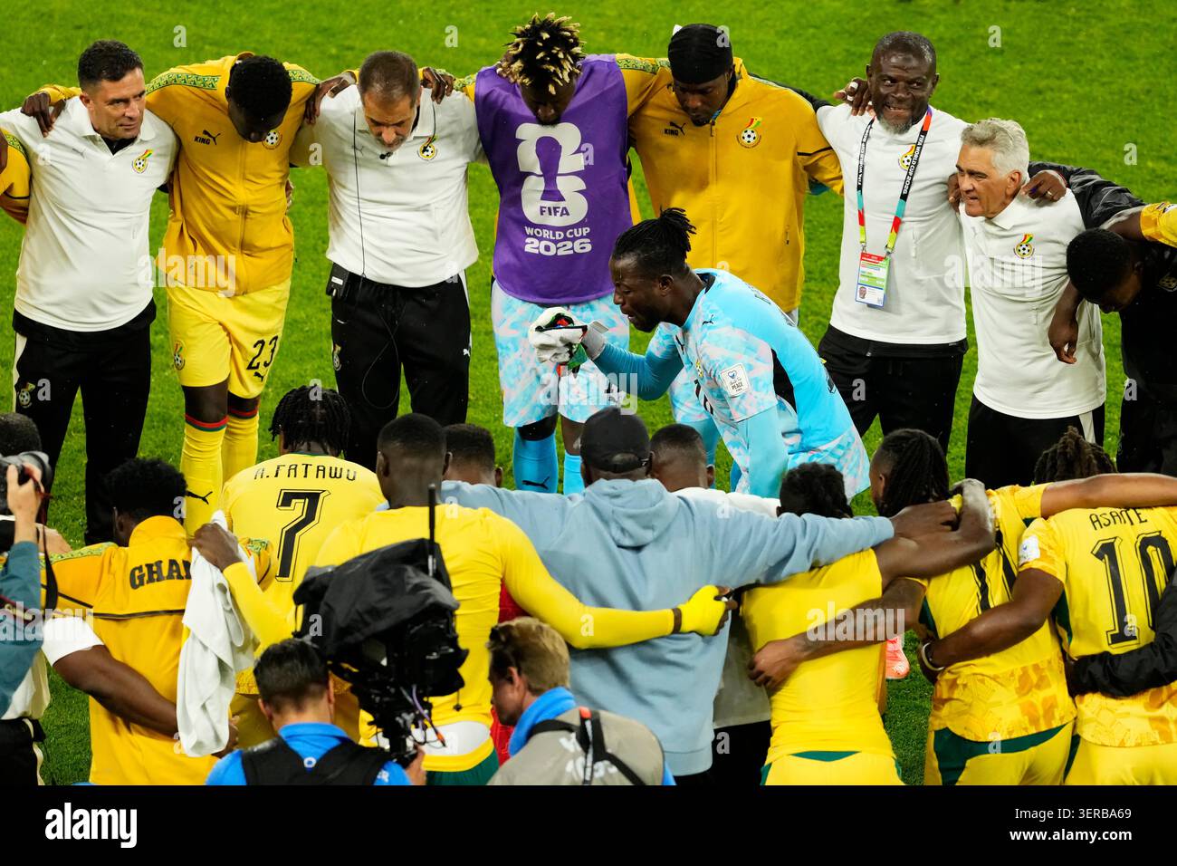Ghana goalkeeper Benjamin Asare, center, leads a celebration after the ...