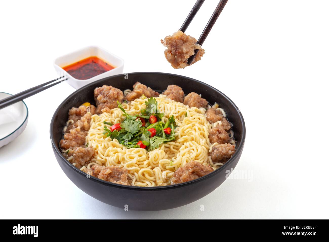 Chinese Donkey Meatball Noodle Soup with Fresh Herbs Stock Photo - Alamy