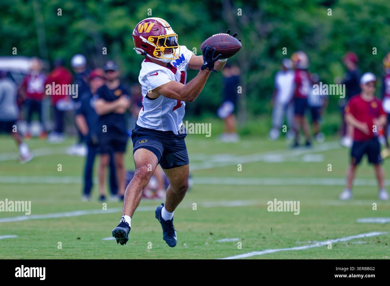 Washington Commanders running back Rachaad White (1) catches a pass at ...