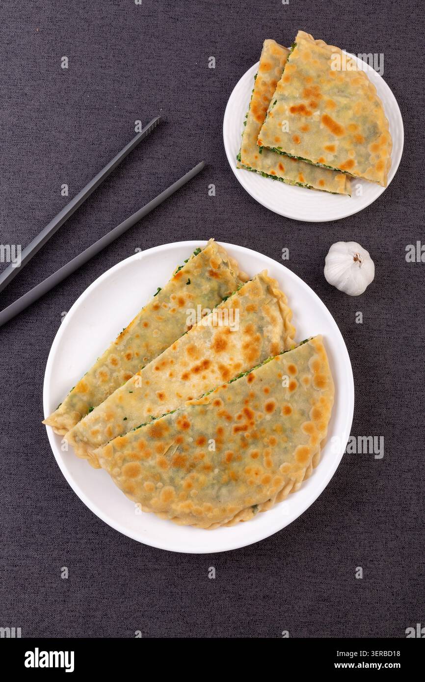 Traditional Chinese Chive and Egg Stuffed Flatbread on Plate, Savory ...