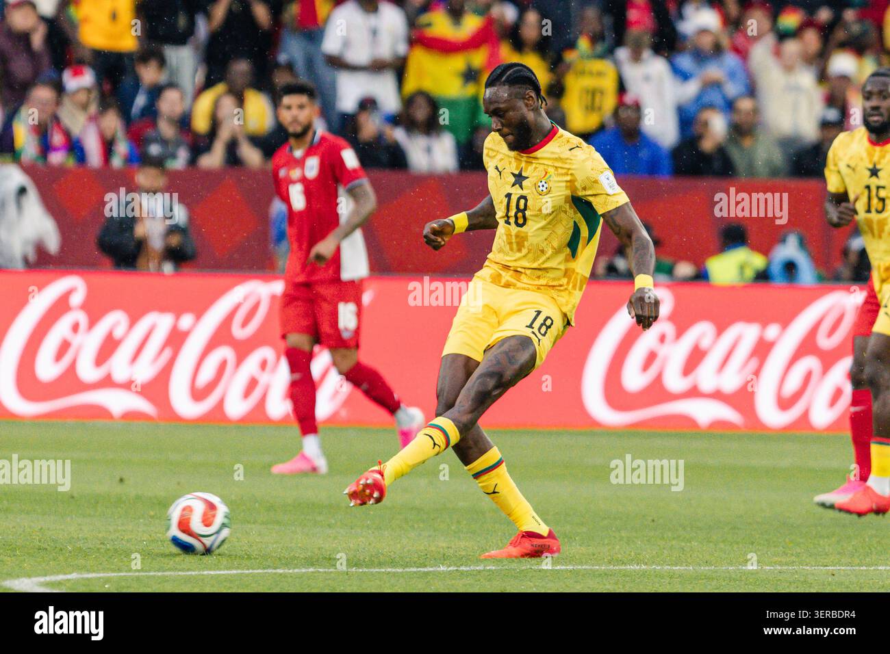 Jerome Opoku of Ghana passes the ball during the FIFA World Cup game ...