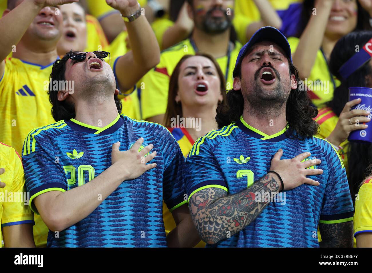 Colombia fans sing along with their national anthem before the World ...
