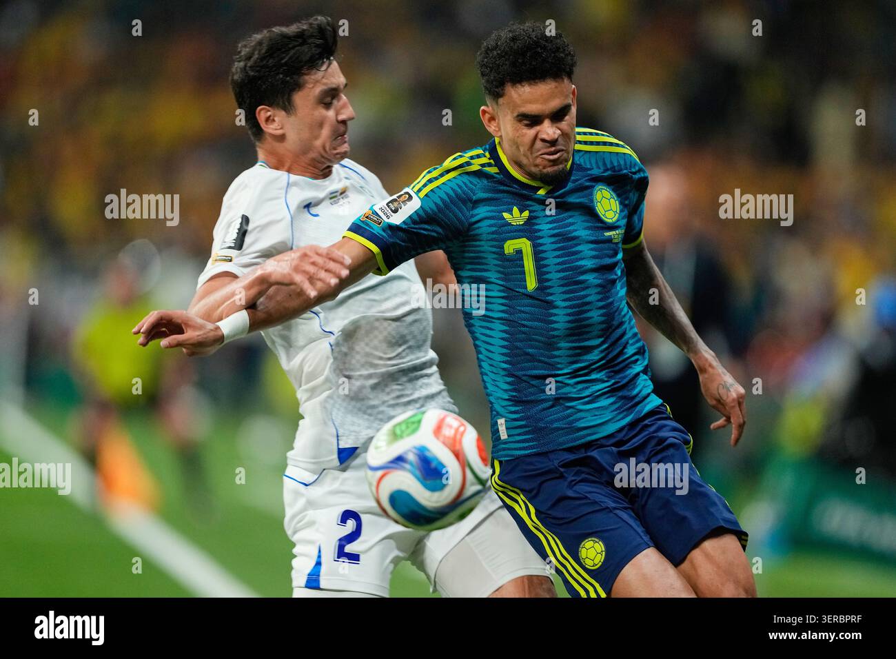Colombia's Luis Diaz, right, reacts after he was fouled by Uzbekistan's ...