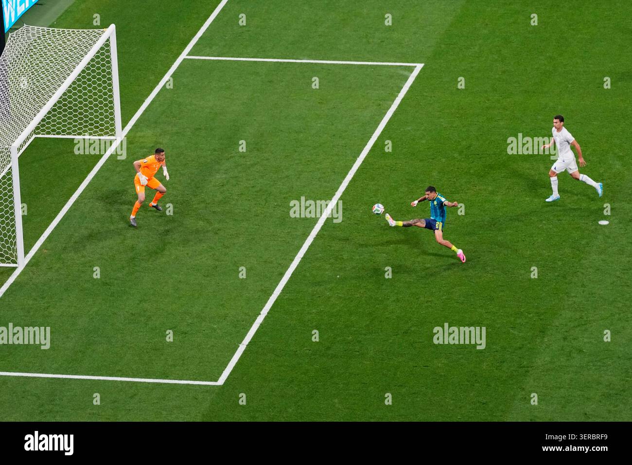 Colombia's Daniel Munoz (2), second right, scores the opening goal ...