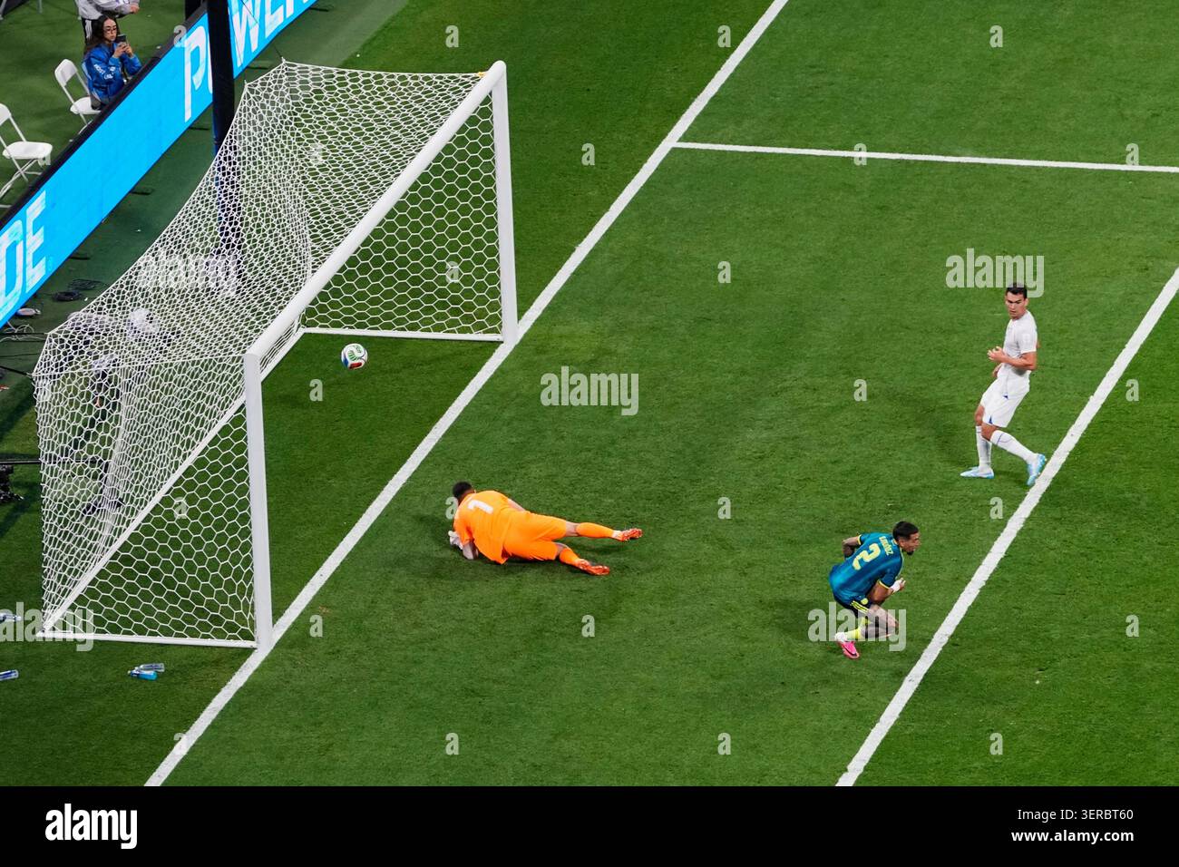 Colombia's Daniel Munoz (2), second right, scores the opening goal ...