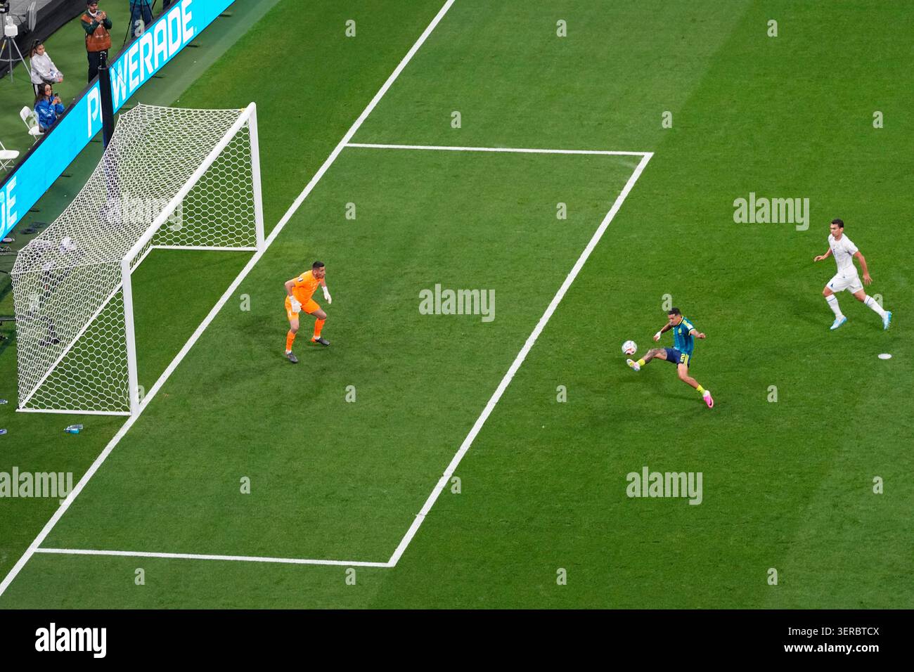 Colombia's Daniel Munoz (2), second right, scores the opening goal ...