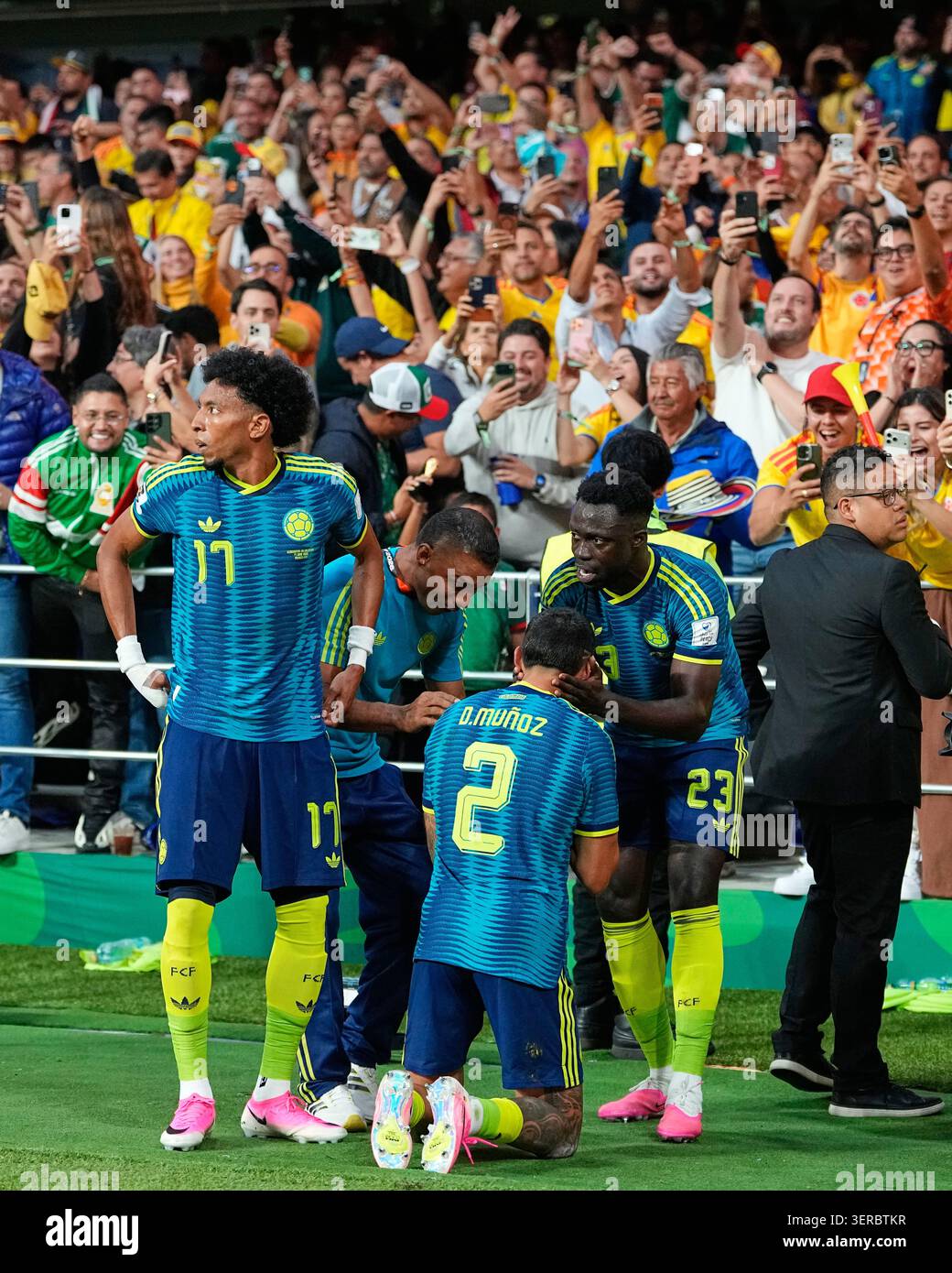 Colombia's Daniel Munoz (2) celebrates with teammates after scoring his ...