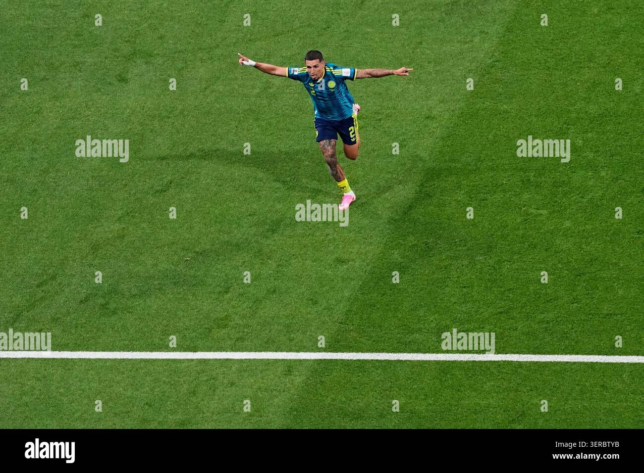 Colombia's Daniel Munoz (2), celebrates after scoring the opening goal ...