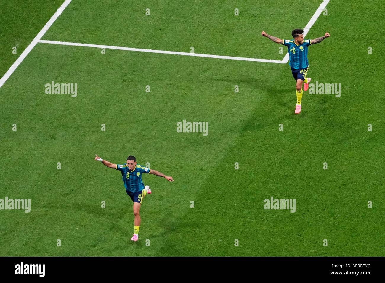 Colombia's Daniel Munoz (2), left, celebrates after scoring the opening ...