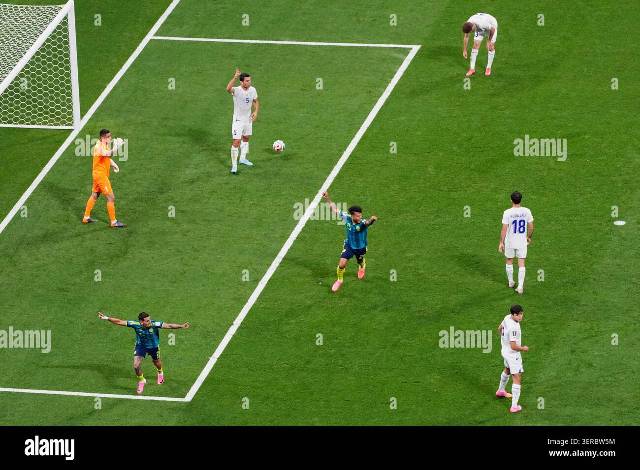 Colombia's Daniel Munoz (2), bottom left, celebrates after scoring the ...