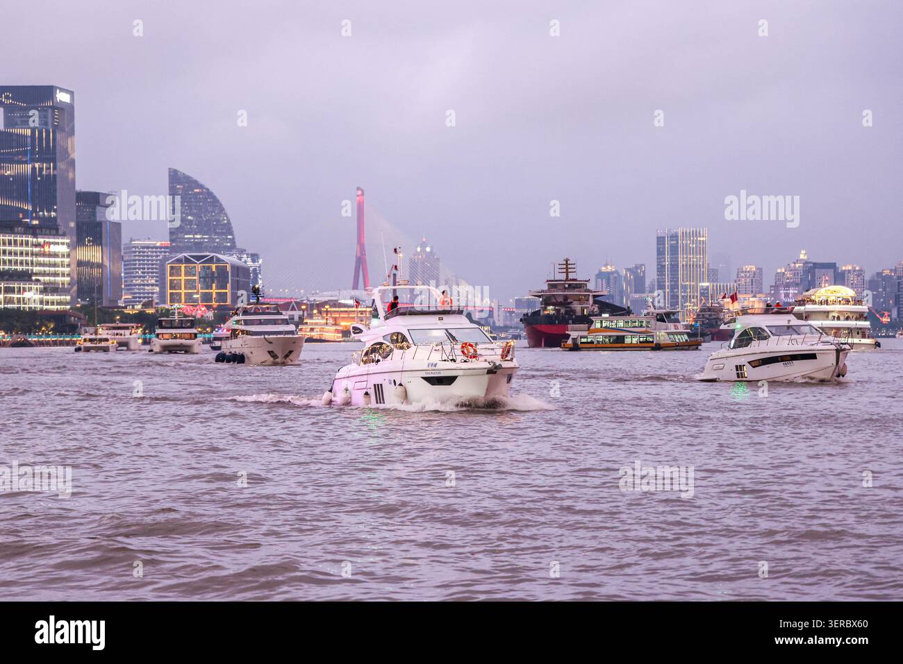 Yacht fleets appear on the Huangpu River during the 2026 Shanghai ...