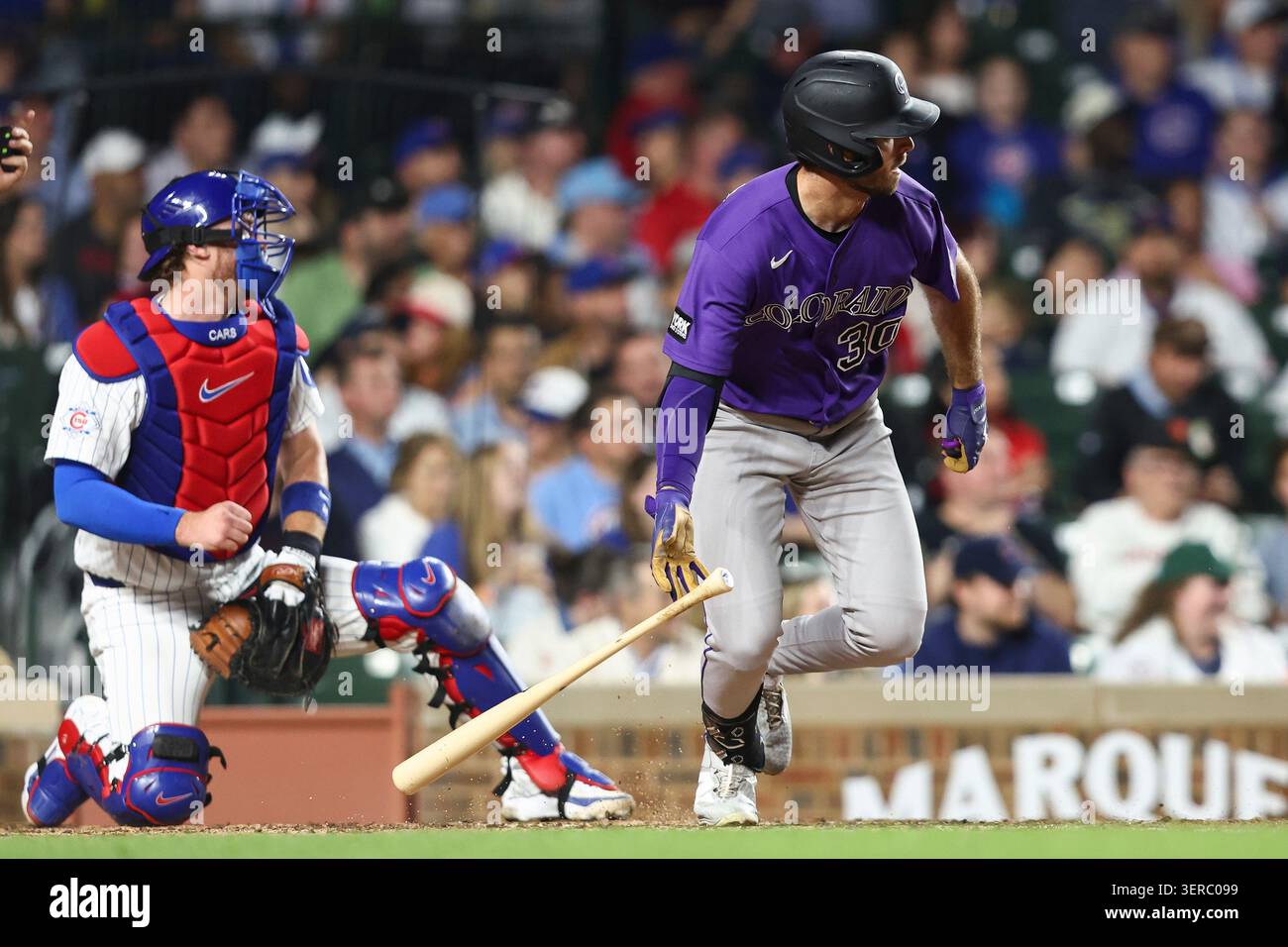Colorado Rockies designated hitter Sterlin Thompson drops his bat after ...
