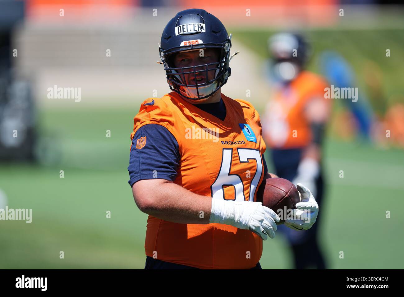 Denver Broncos center Michael Deiter takes part in drills during an NFL ...