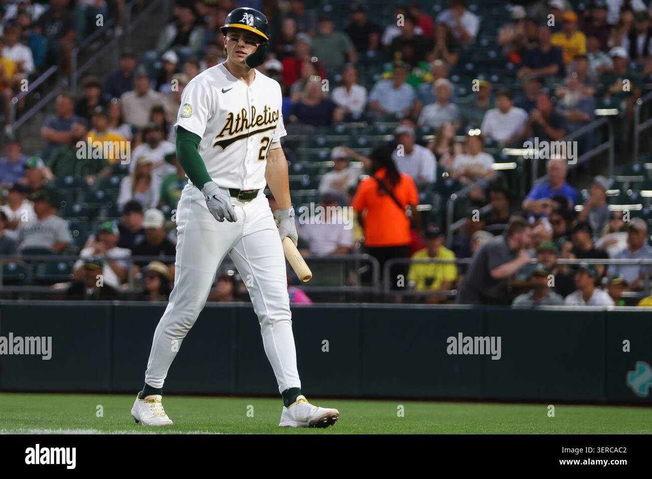 Athletics' Zack Gelof walks to the dugout after striking out during the ...