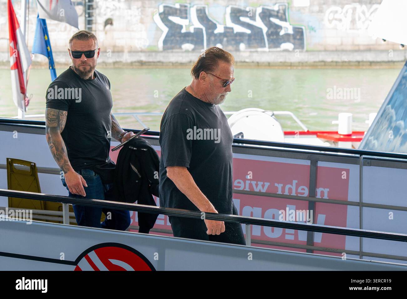 Arnold Schwarzenegger takes a “Boat Trip City Cruise” on the Danube ...