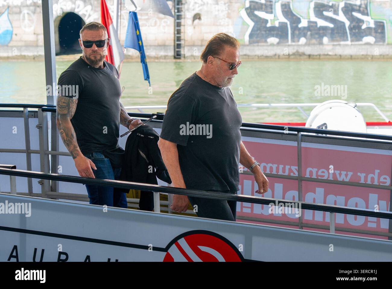 Arnold Schwarzenegger takes a “Boat Trip City Cruise” on the Danube ...