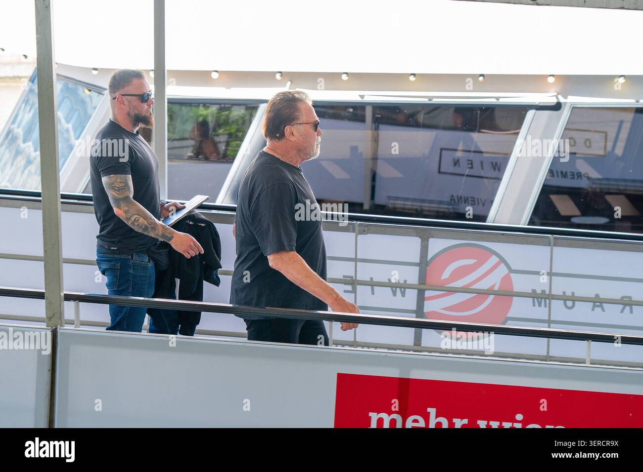 Arnold Schwarzenegger takes a “Boat Trip City Cruise” on the Danube ...