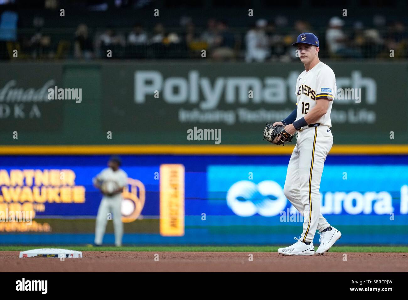 Milwaukee Brewers' Cooper Pratt looks on during a baseball game against ...