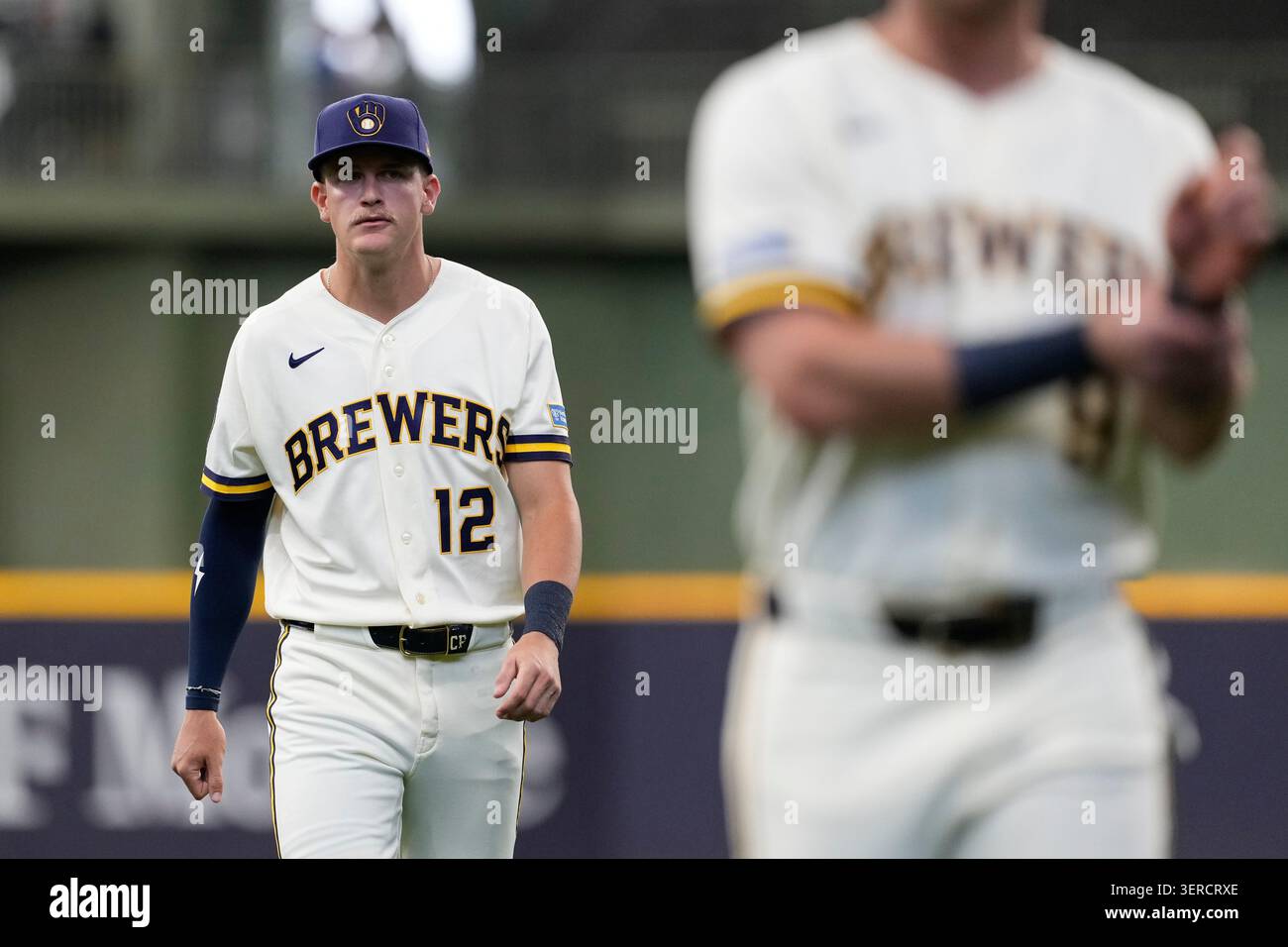 Milwaukee Brewers' Cooper Pratt warms up before a baseball game against ...