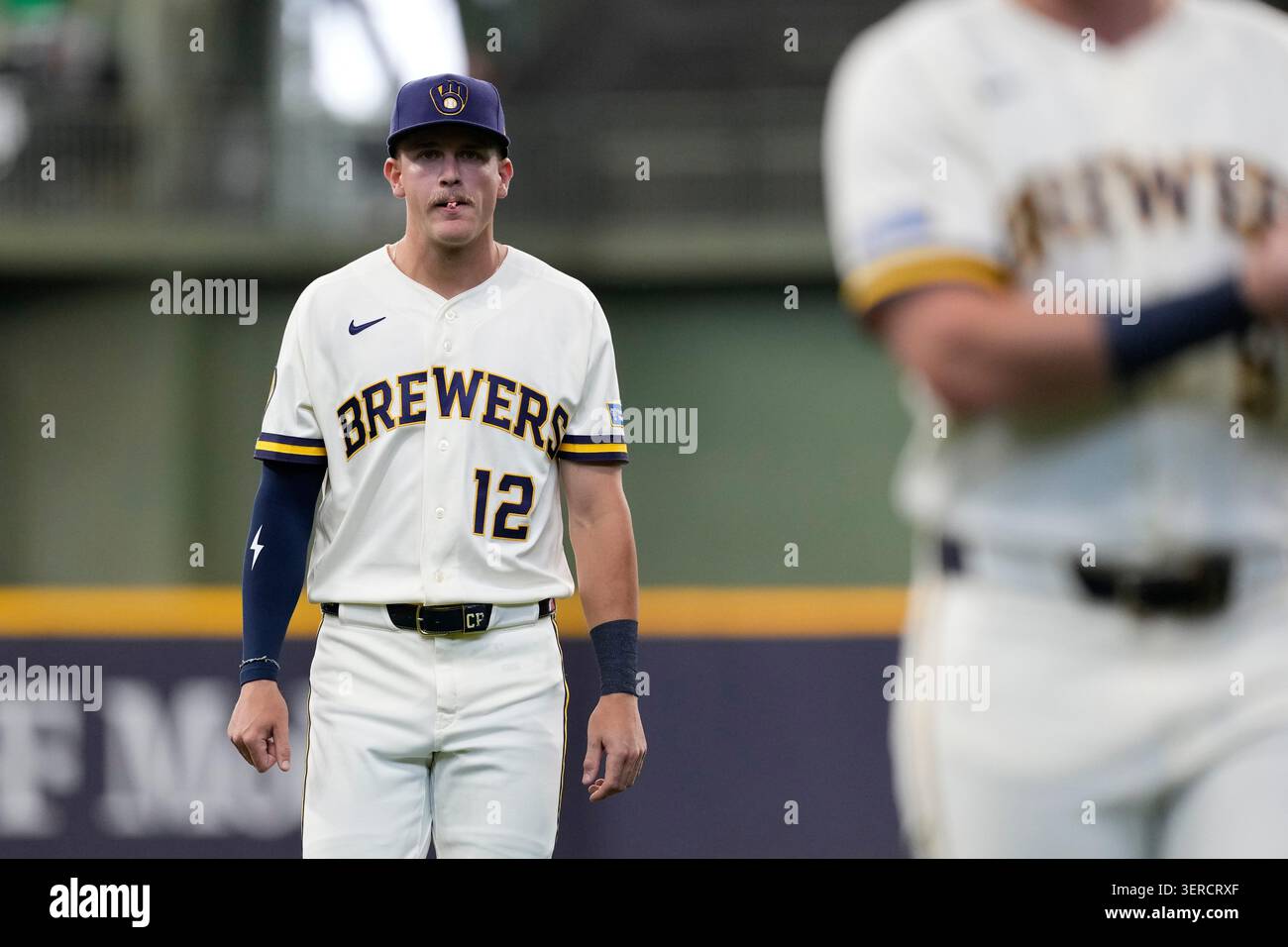 Milwaukee Brewers' Cooper Pratt warms up before a baseball game against ...