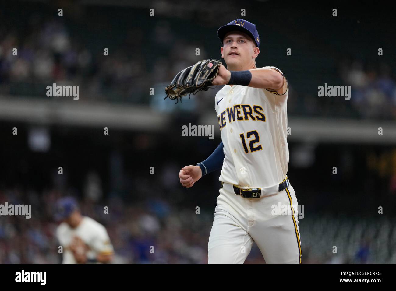Milwaukee Brewers' Cooper Pratt jogs to the dugout during a baseball ...