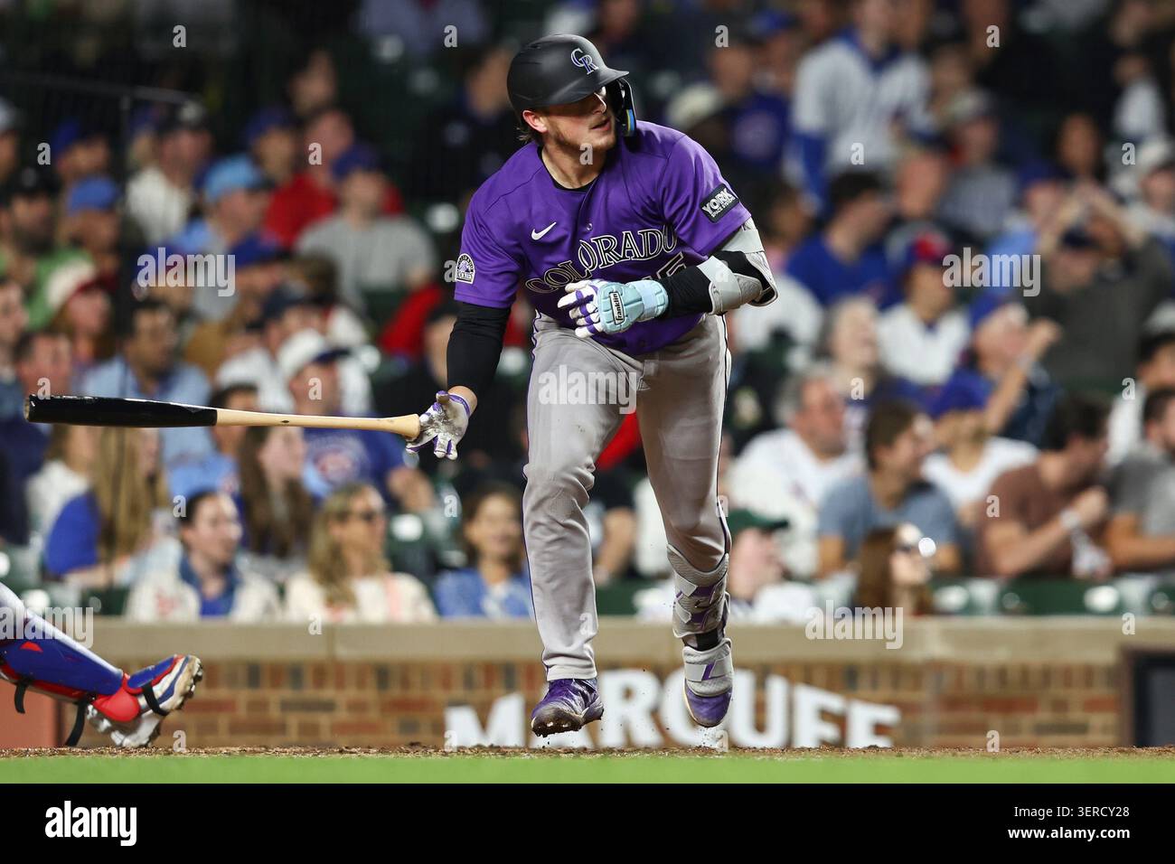 Colorado Rockies' Hunter Goodman drops his bat after hitting a home run ...