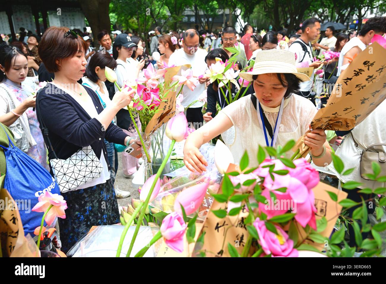 Visitors crowd at the upgraded Lotus Market with over 100 stalls ...