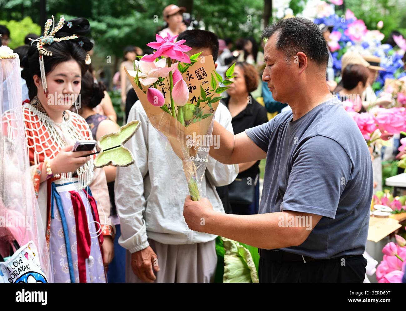 Visitors crowd at the upgraded Lotus Market with over 100 stalls ...