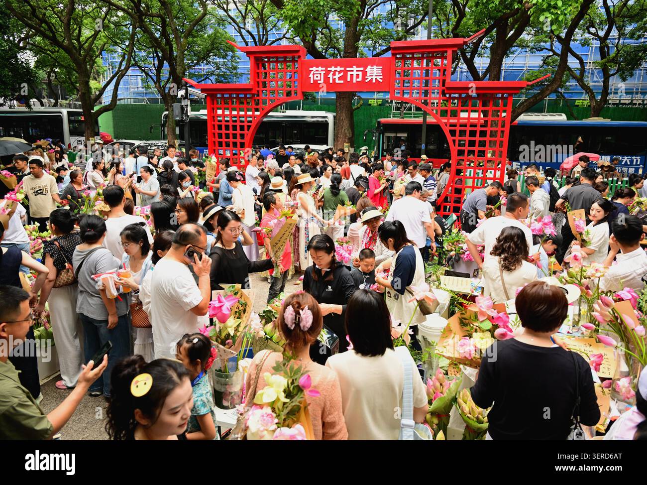 Visitors crowd at the upgraded Lotus Market with over 100 stalls ...