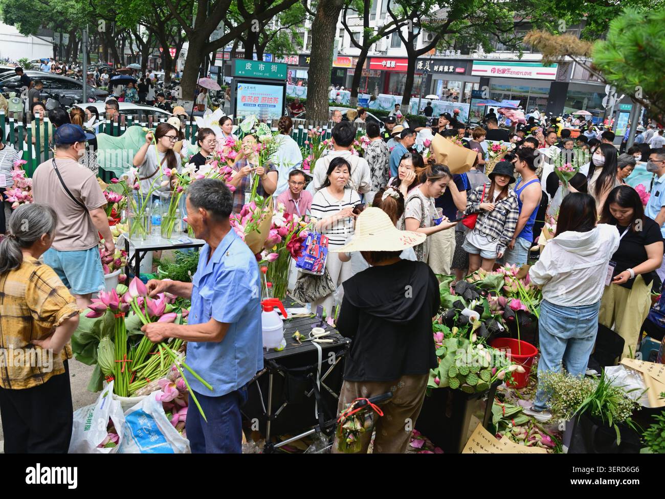 Visitors crowd at the upgraded Lotus Market with over 100 stalls ...