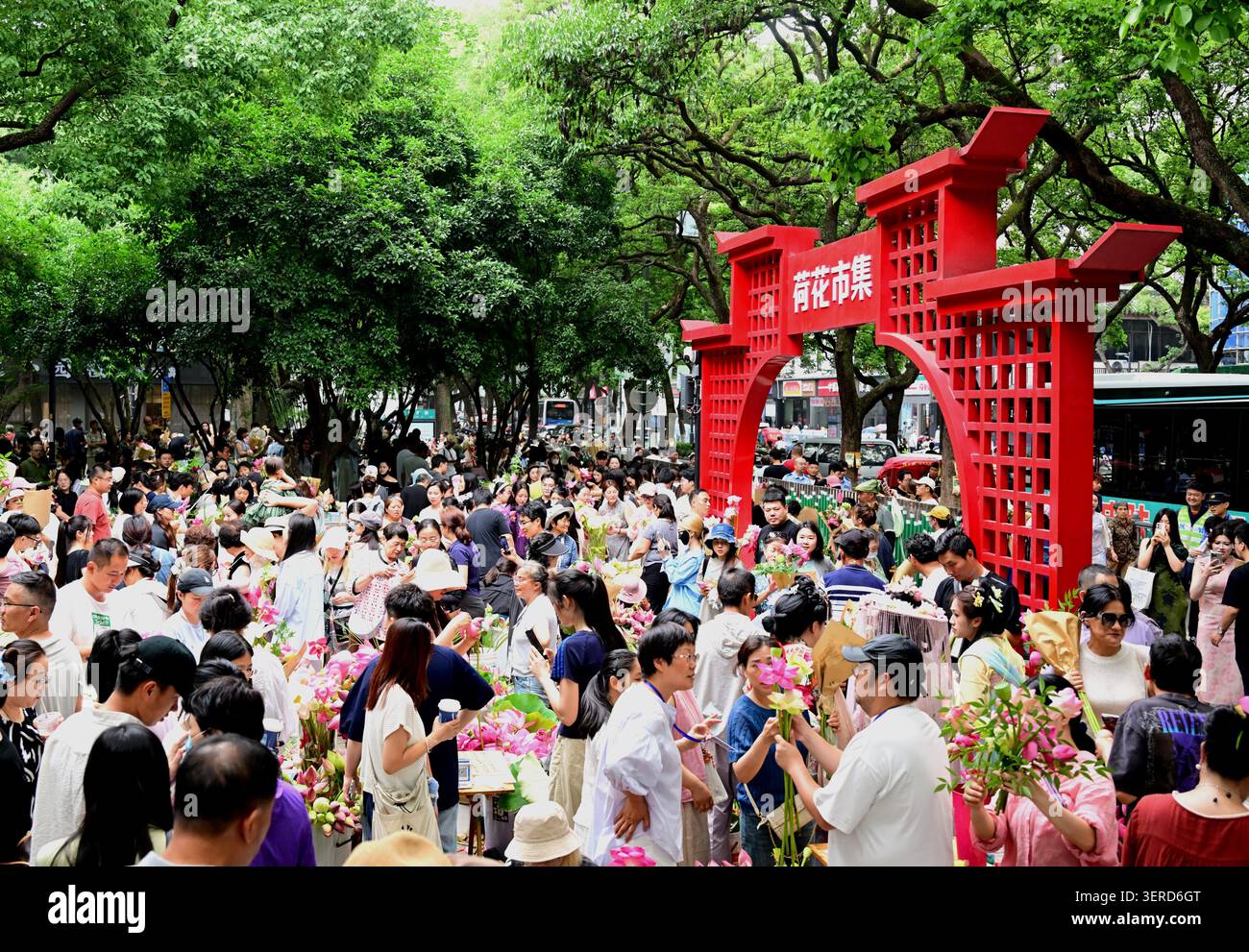 Visitors crowd at the upgraded Lotus Market with over 100 stalls ...