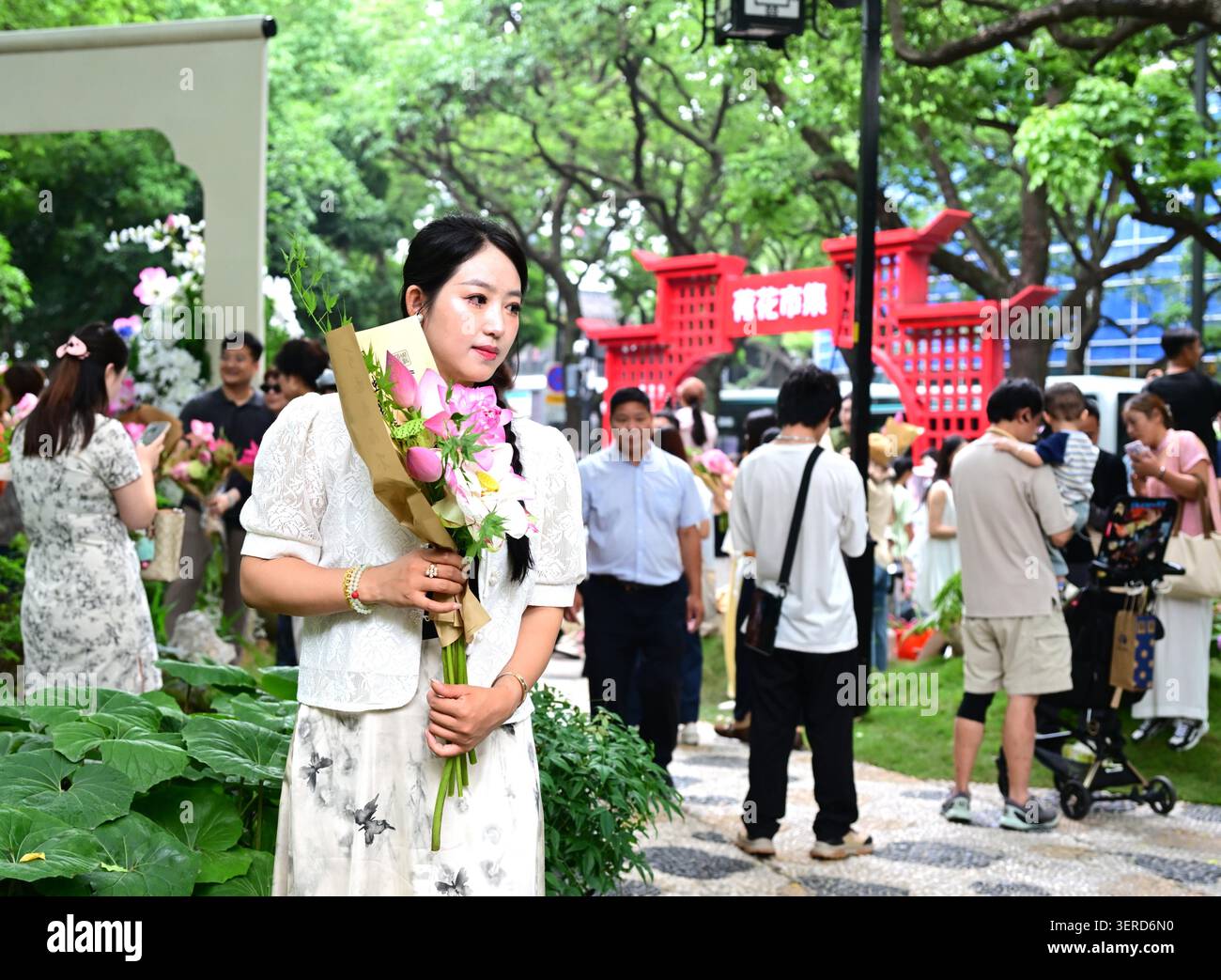 Visitors crowd at the upgraded Lotus Market with over 100 stalls ...