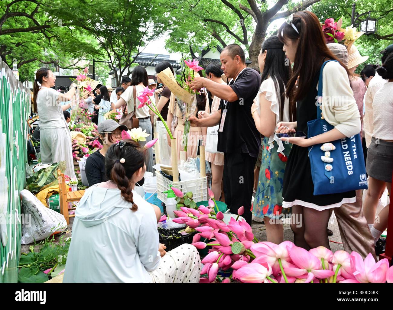 Visitors crowd at the upgraded Lotus Market with over 100 stalls ...