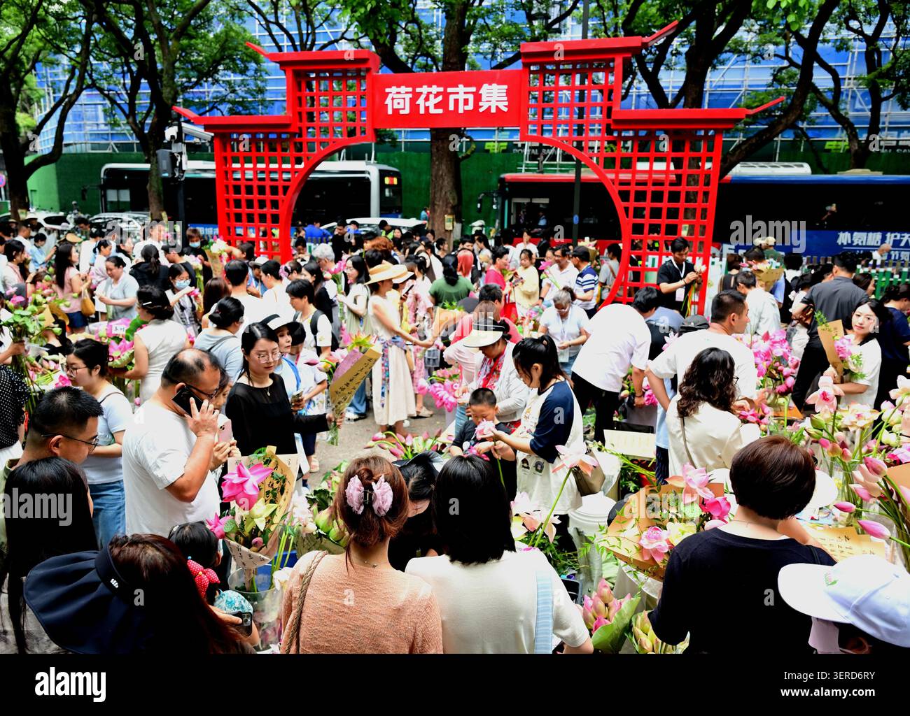 Visitors crowd at the upgraded Lotus Market with over 100 stalls ...