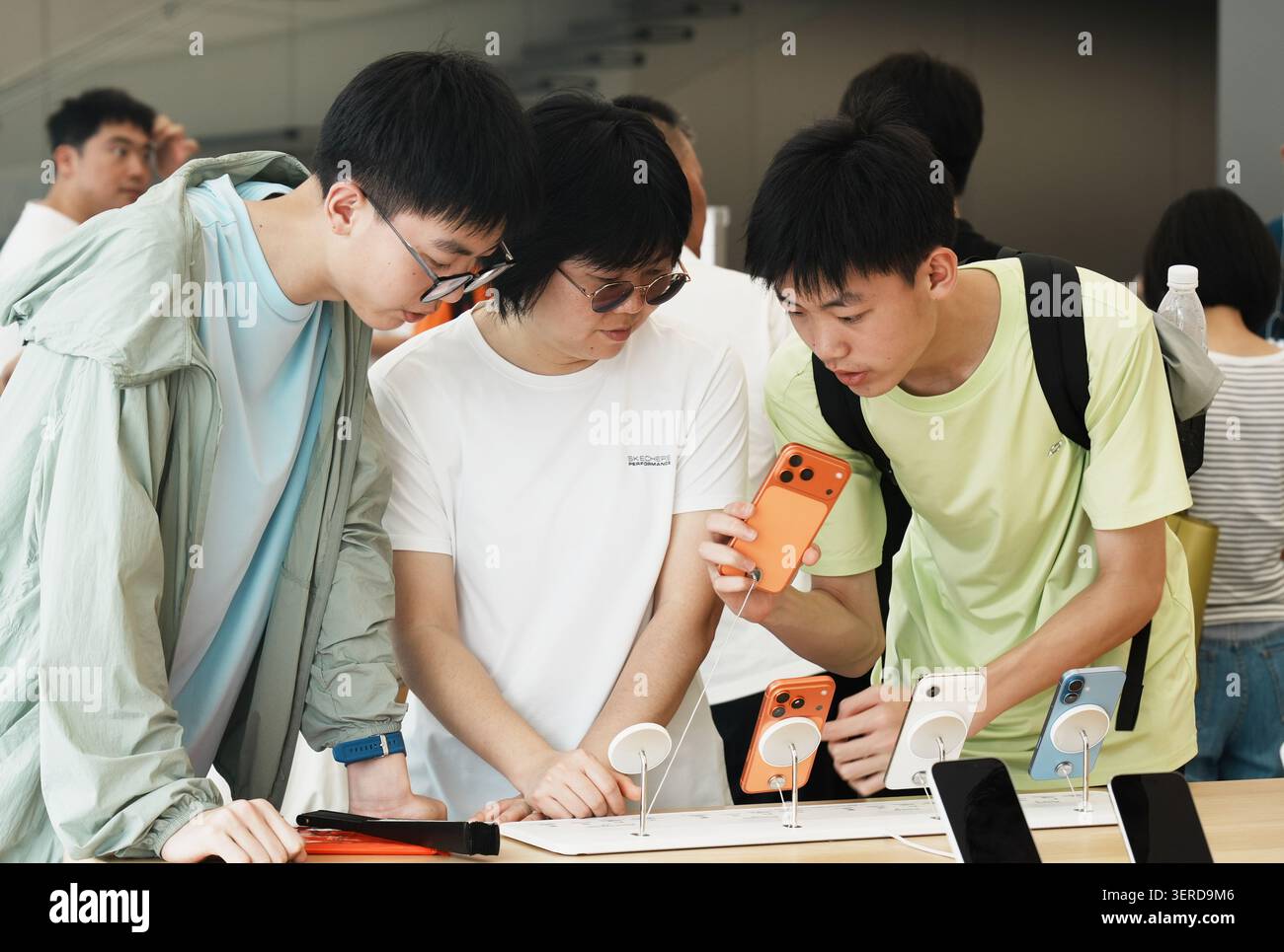 HANGZHOU, CHINA - JUNE 18, 2026 - Customers purchase iPhone 17 series ...