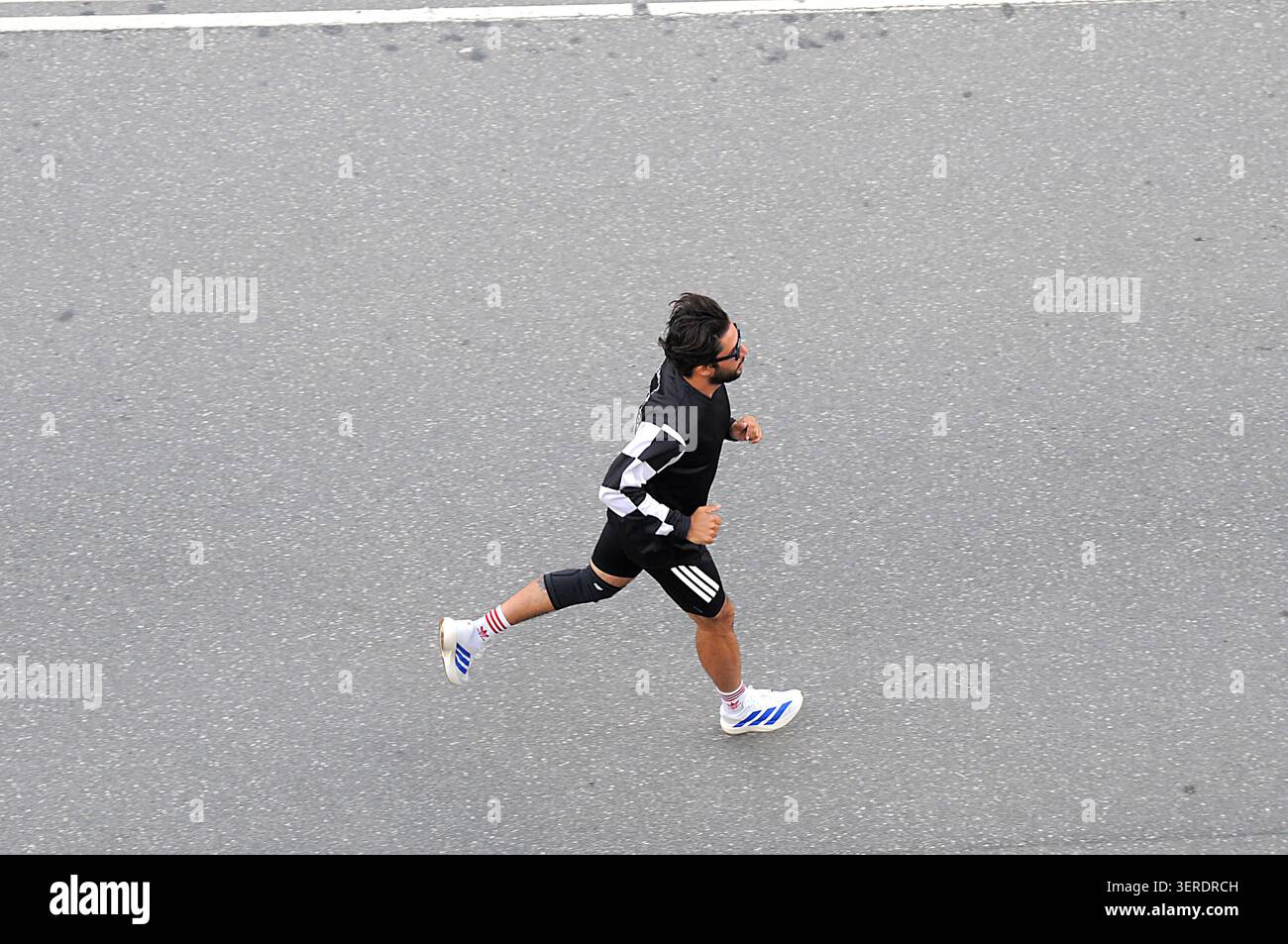 Copenhagen/Denmark /18 JUNE 2026/ man running t keep fitness in line in ...