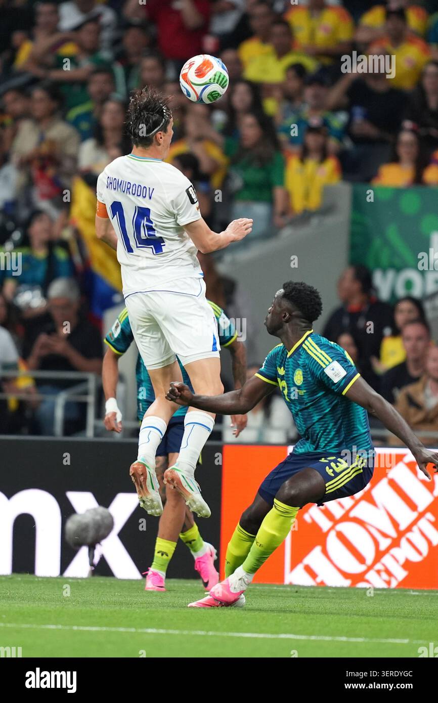 Eldor Shomurodov #14 of Uzbekistan heads the ball during the FIFA World ...