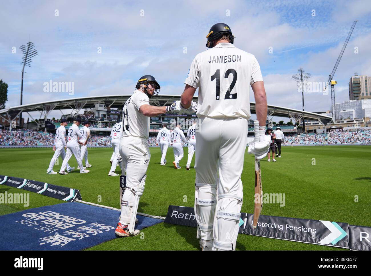 New Zealand's Glenn Phillips and Kyle Jamieson head out to bat before ...
