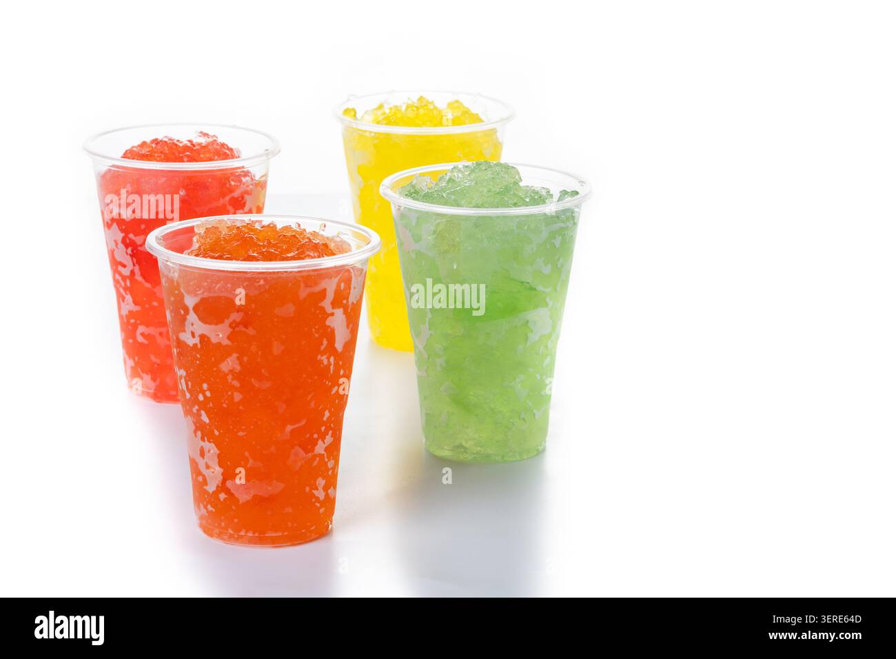 Colorful Frozen Slush Drinks in Plastic Cups Isolated on White ...