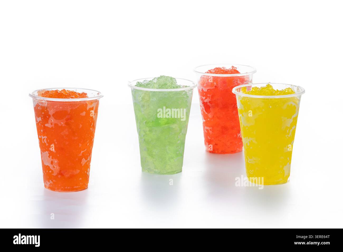Colorful Frozen Slush Drinks in Plastic Cups Isolated on White ...
