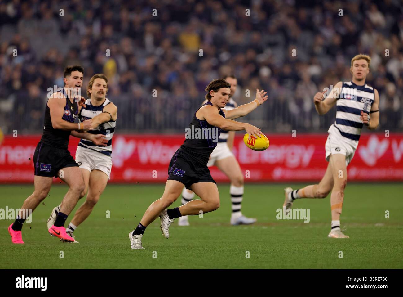 Caleb Serong of the Dockers kicks the ball during the AFL Round 15 ...