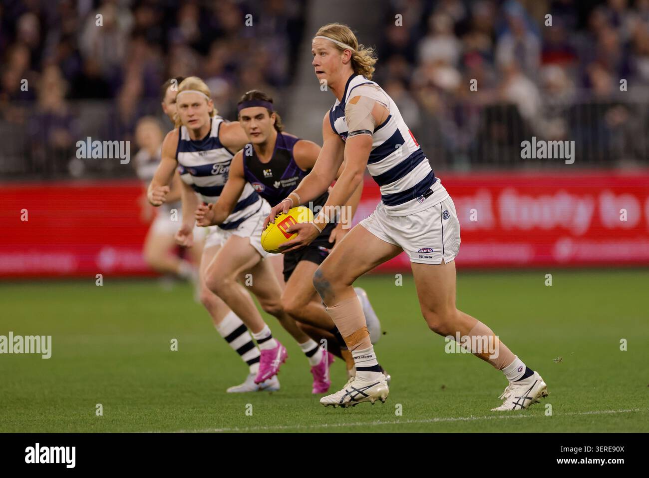Sam De Koning of the Cats runs the ball during the AFL Round 15 match ...