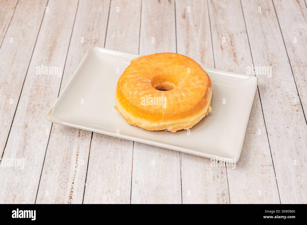 An image of a simple donut, without glaze or embellishments, with its ...