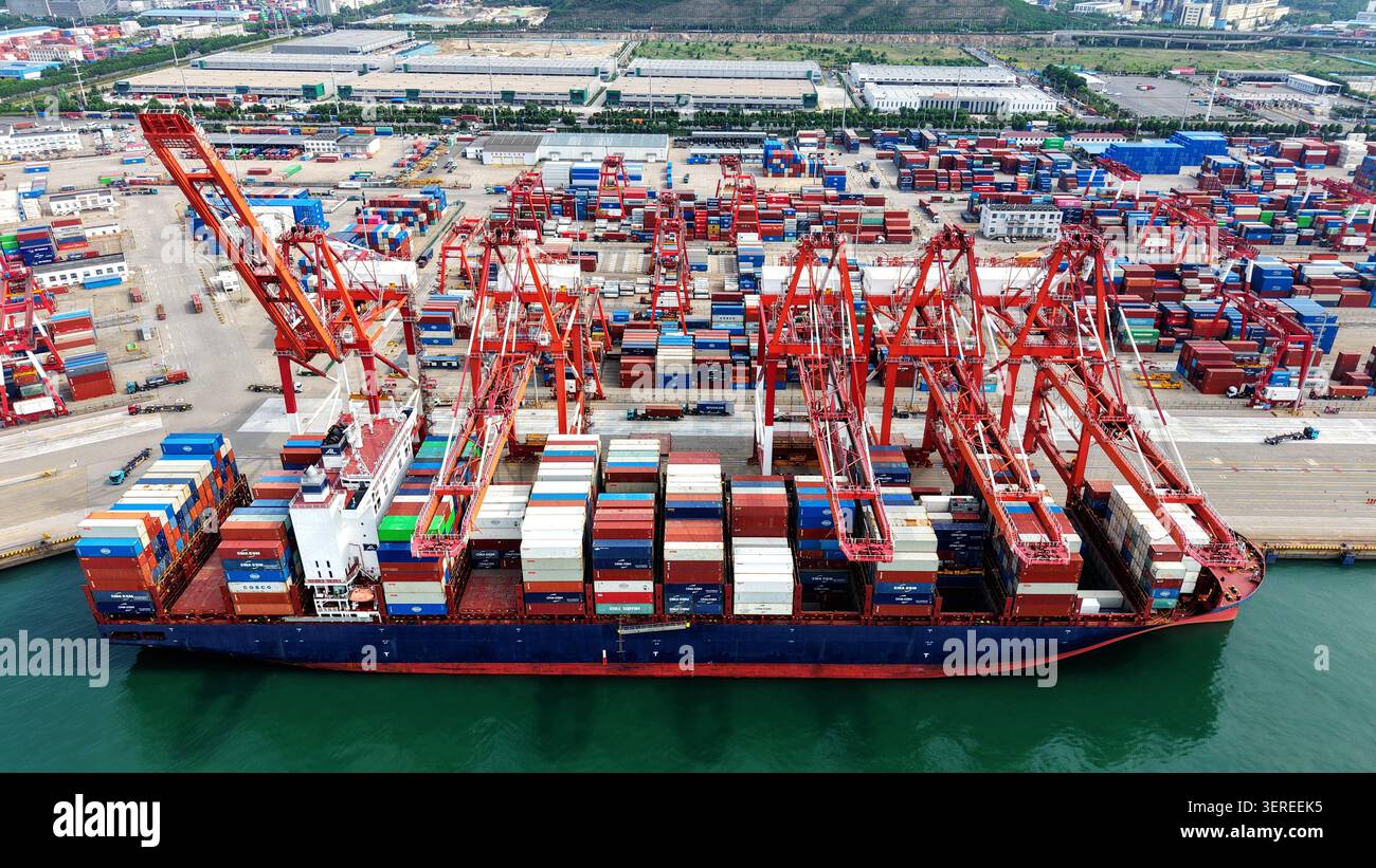 QINGDAO, CHINA - JUNE 18, 2026 - A cargo ship was loaded and unloaded ...