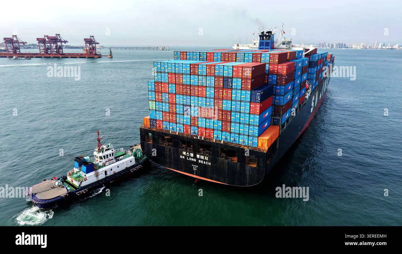 QINGDAO, CHINA - JUNE 18, 2026 - A cargo ship loaded with foreign trade ...
