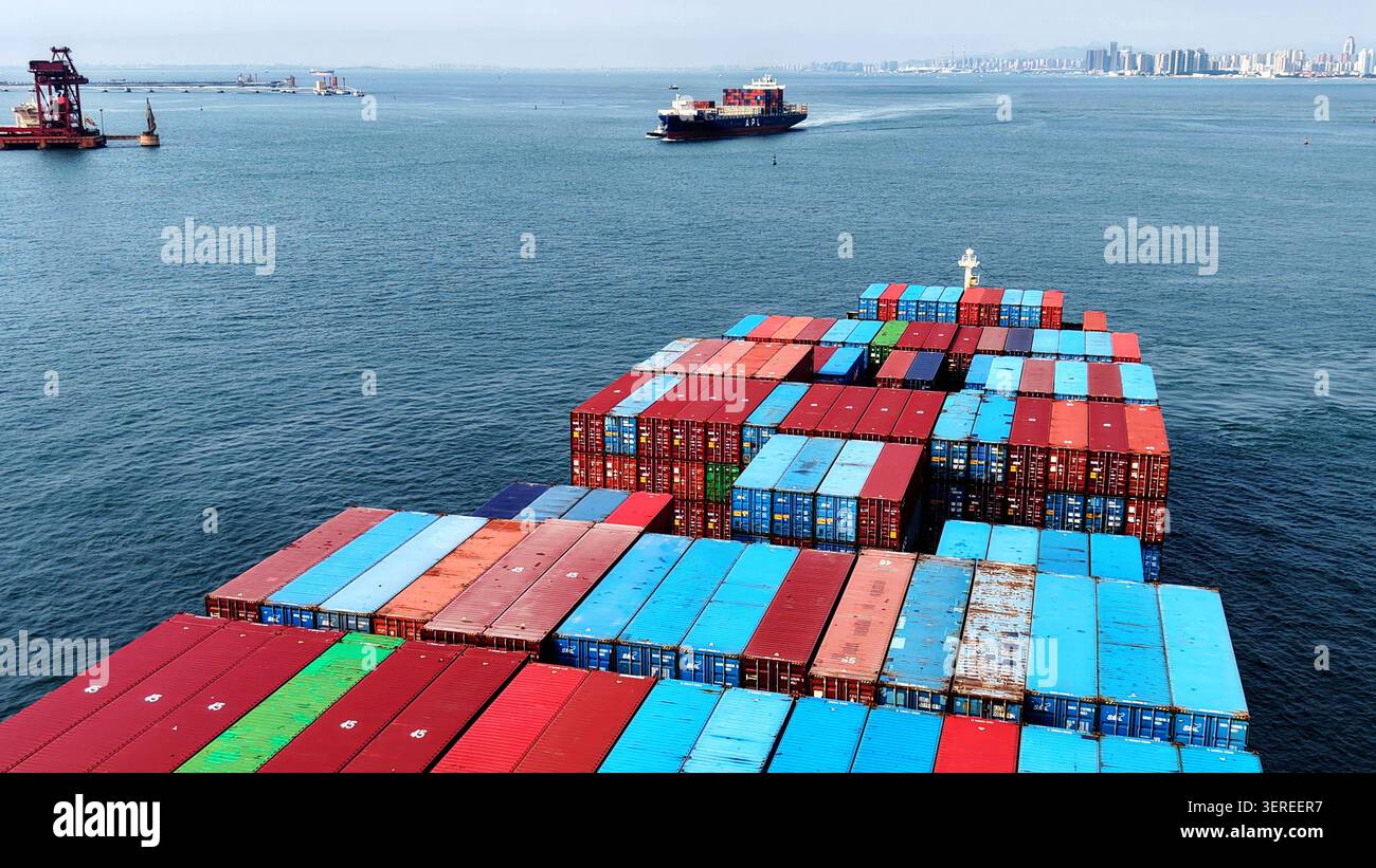 QINGDAO, CHINA - JUNE 18, 2026 - A cargo ship loaded with foreign trade ...