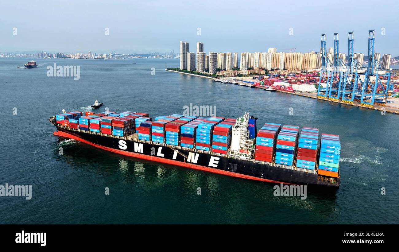 QINGDAO, CHINA - JUNE 18, 2026 - A cargo ship loaded with foreign trade ...