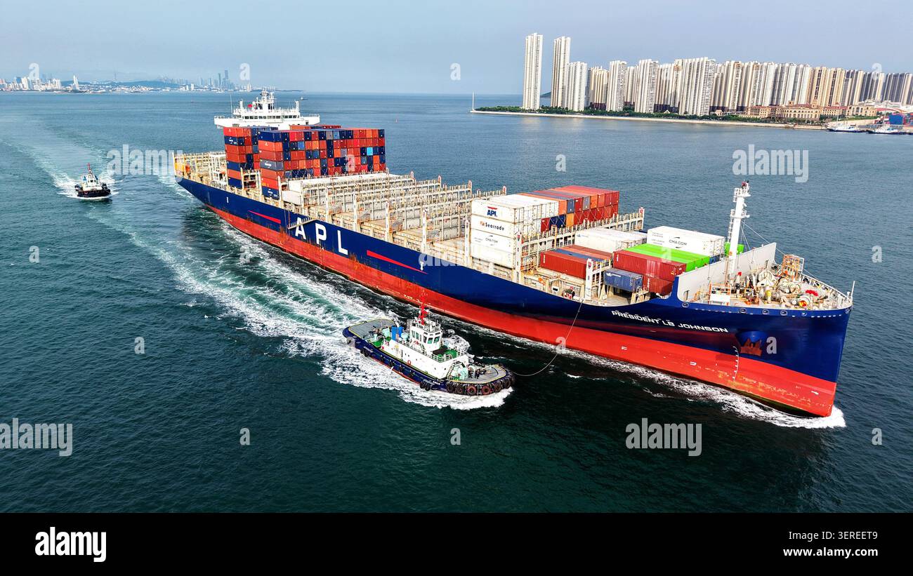 QINGDAO, CHINA - JUNE 18, 2026 - A cargo ship loaded with foreign trade ...