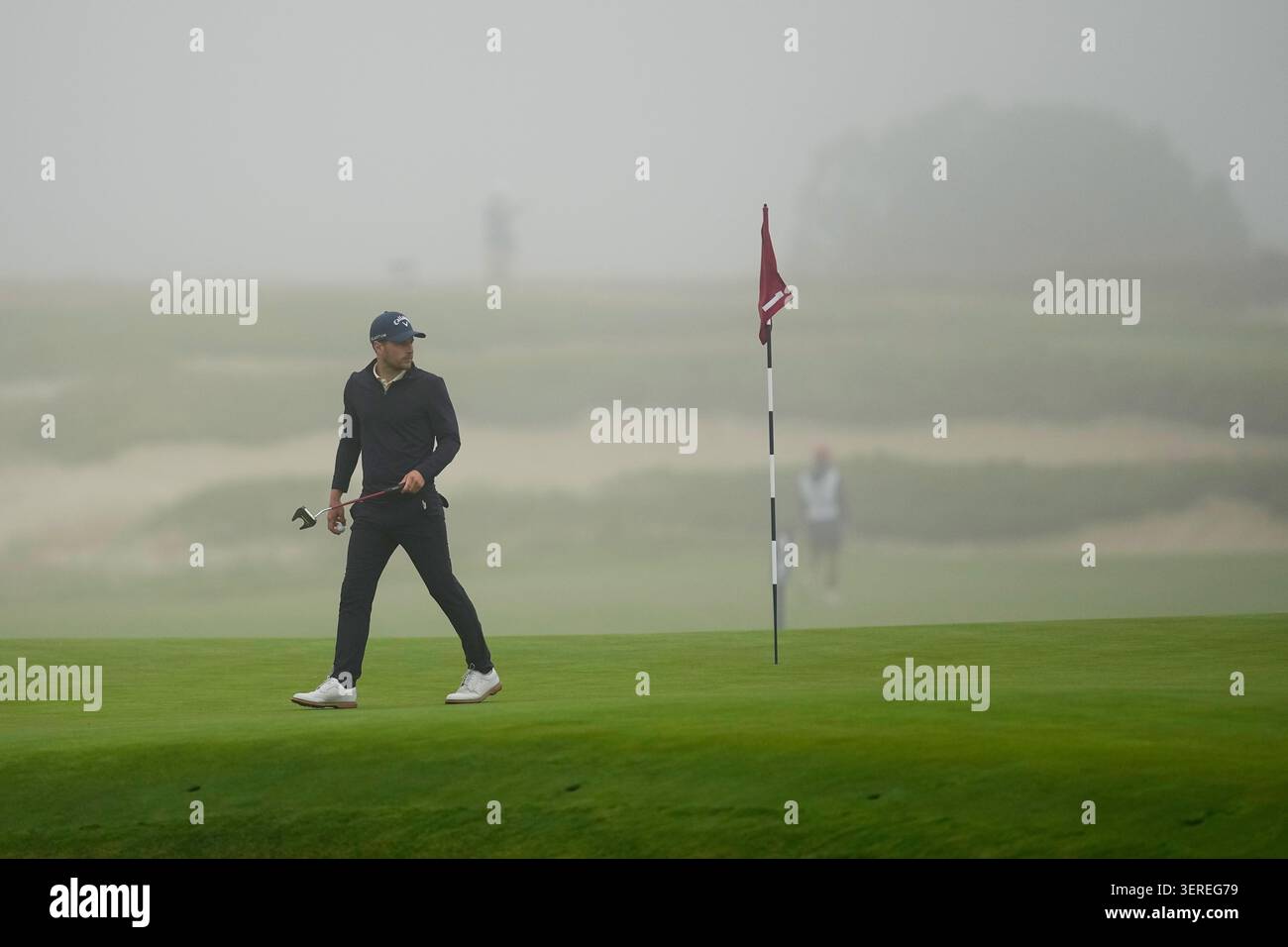Matthew Jordan off the green after play was suspended during the first ...